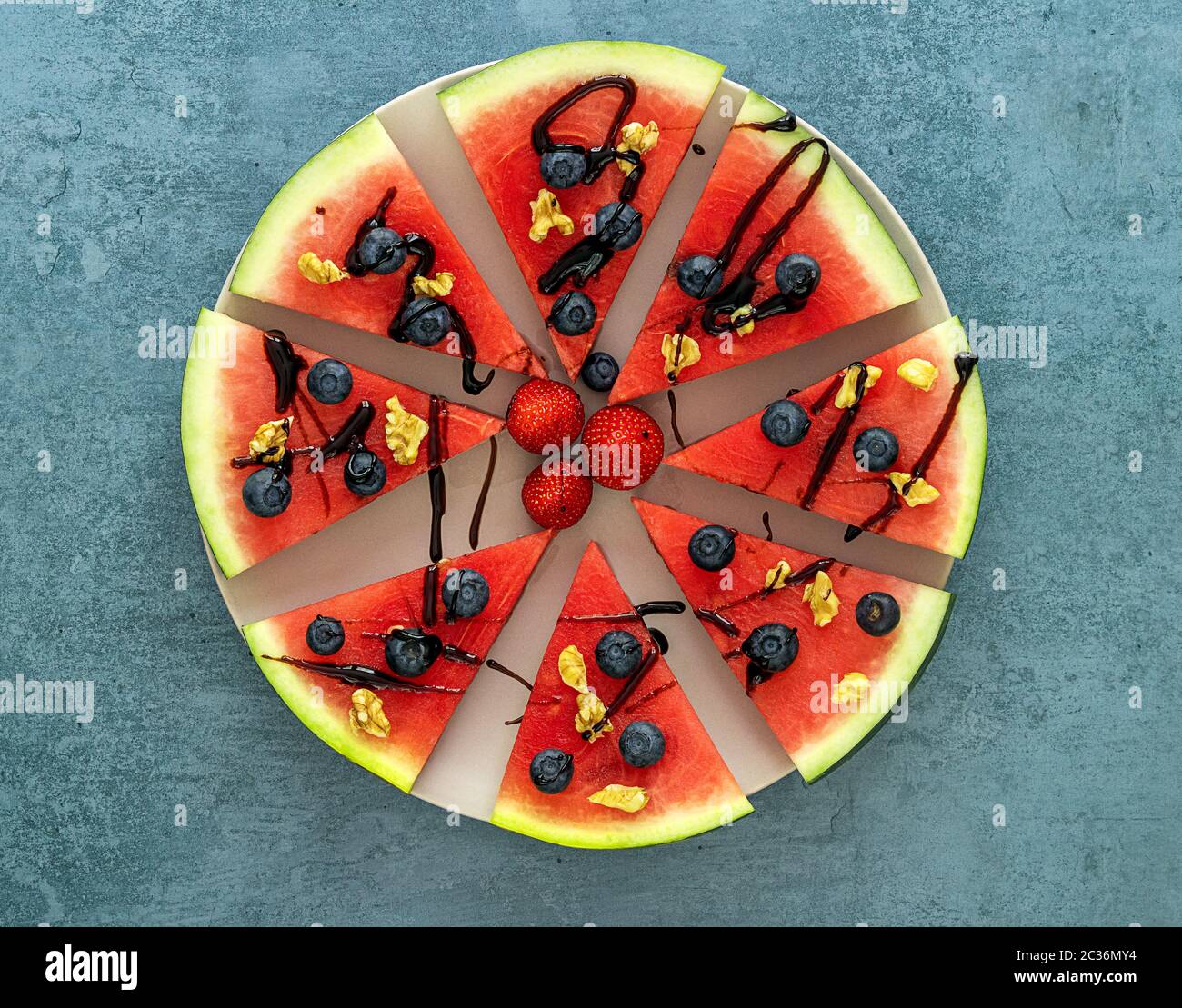Healthy summer snack made of watermelon and berries Stock Photo - Alamy