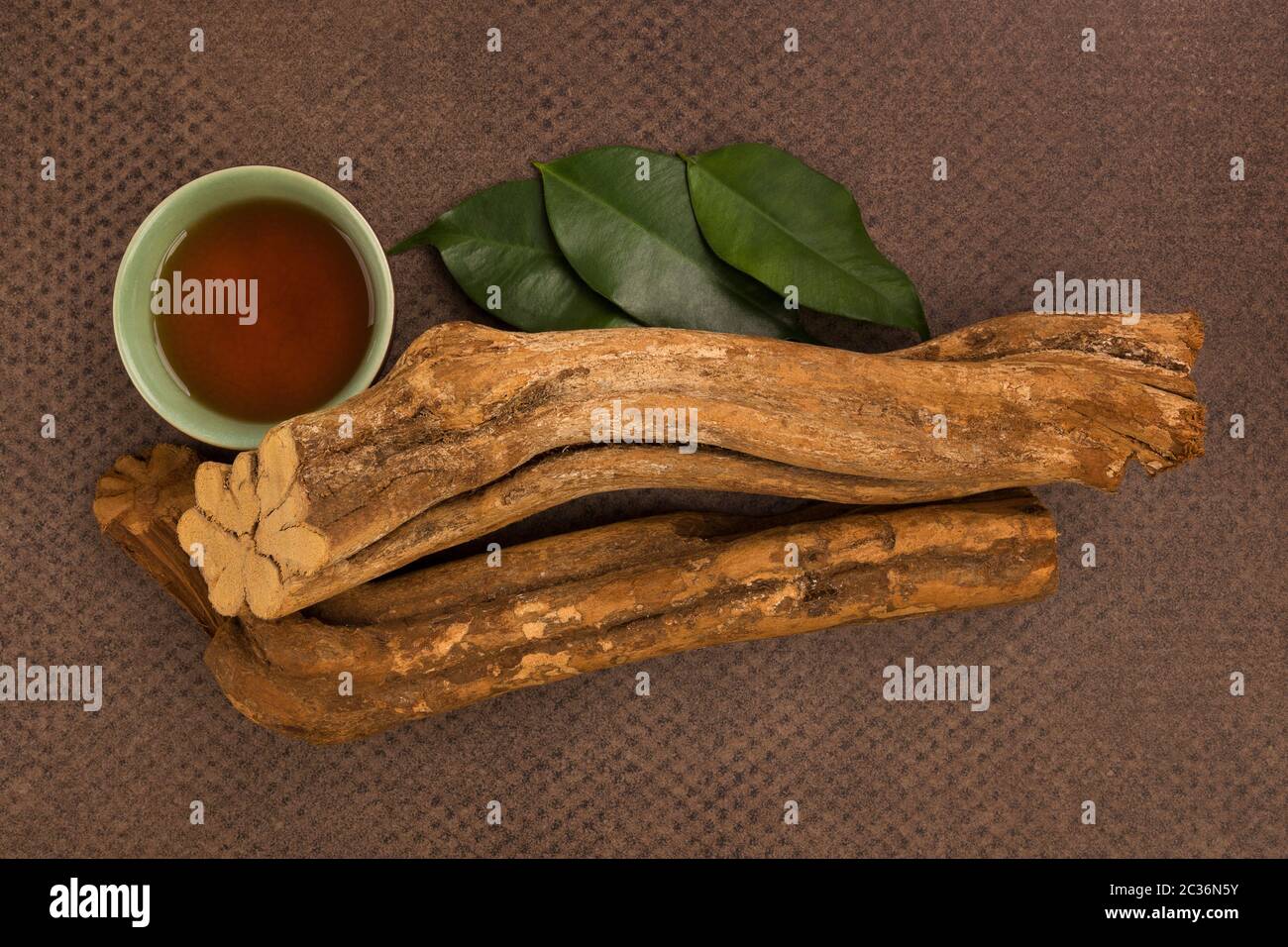 Ayahuasca brew and banisteriopsis caapi wood. Psychedelic drink ...