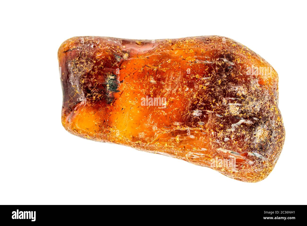 Amber with inclusions in a macro cut out on white background Stock ...