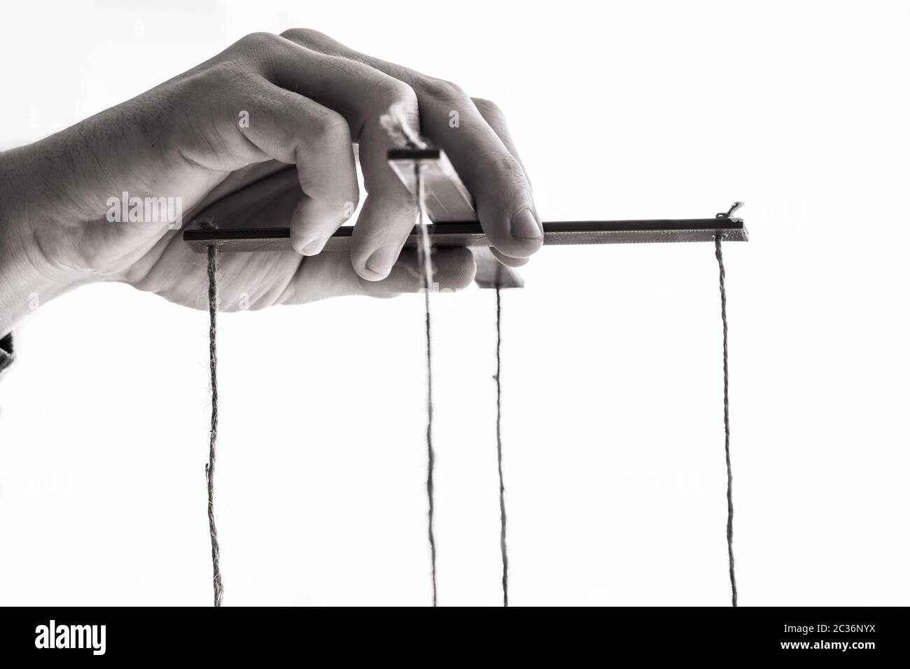 Puppet strings hand hi-res stock photography and images - Alamy