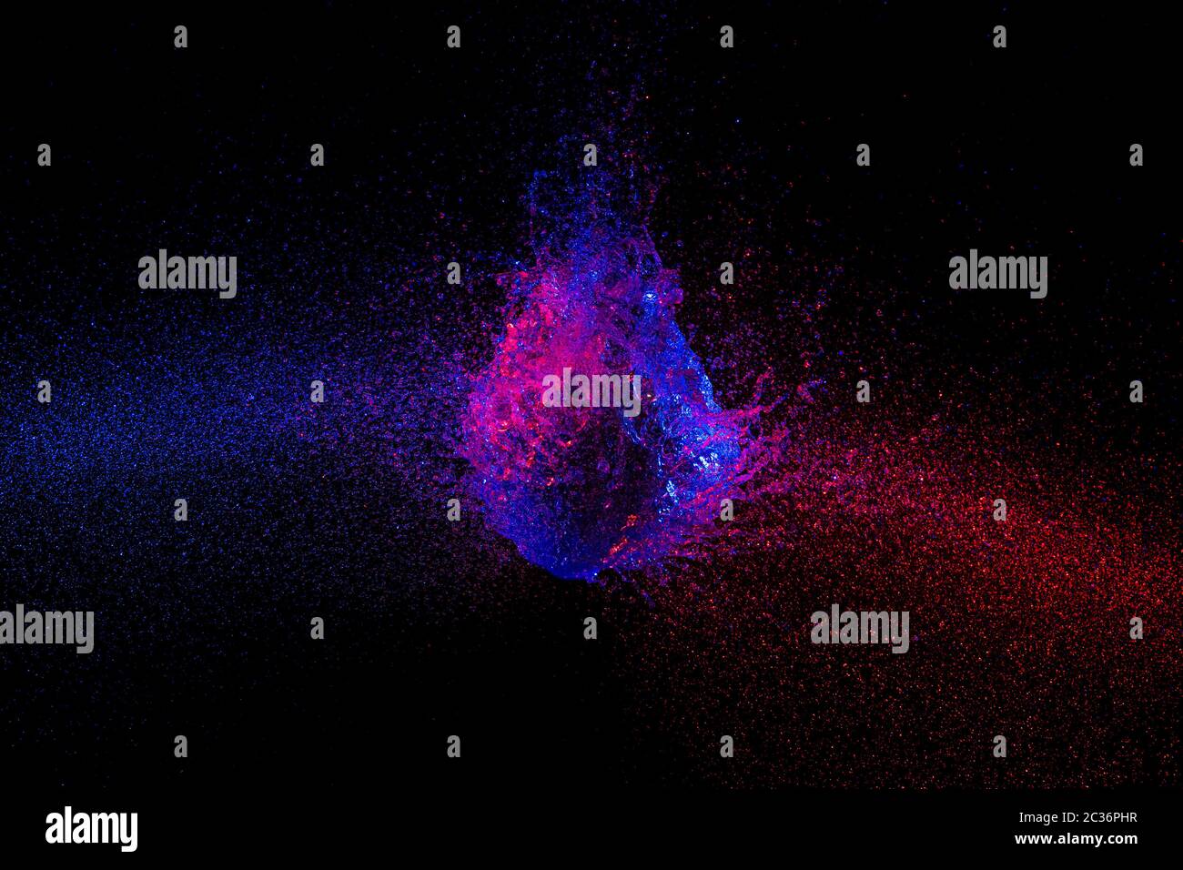 high speed photography. image of the explosion of a balloon filled with ...