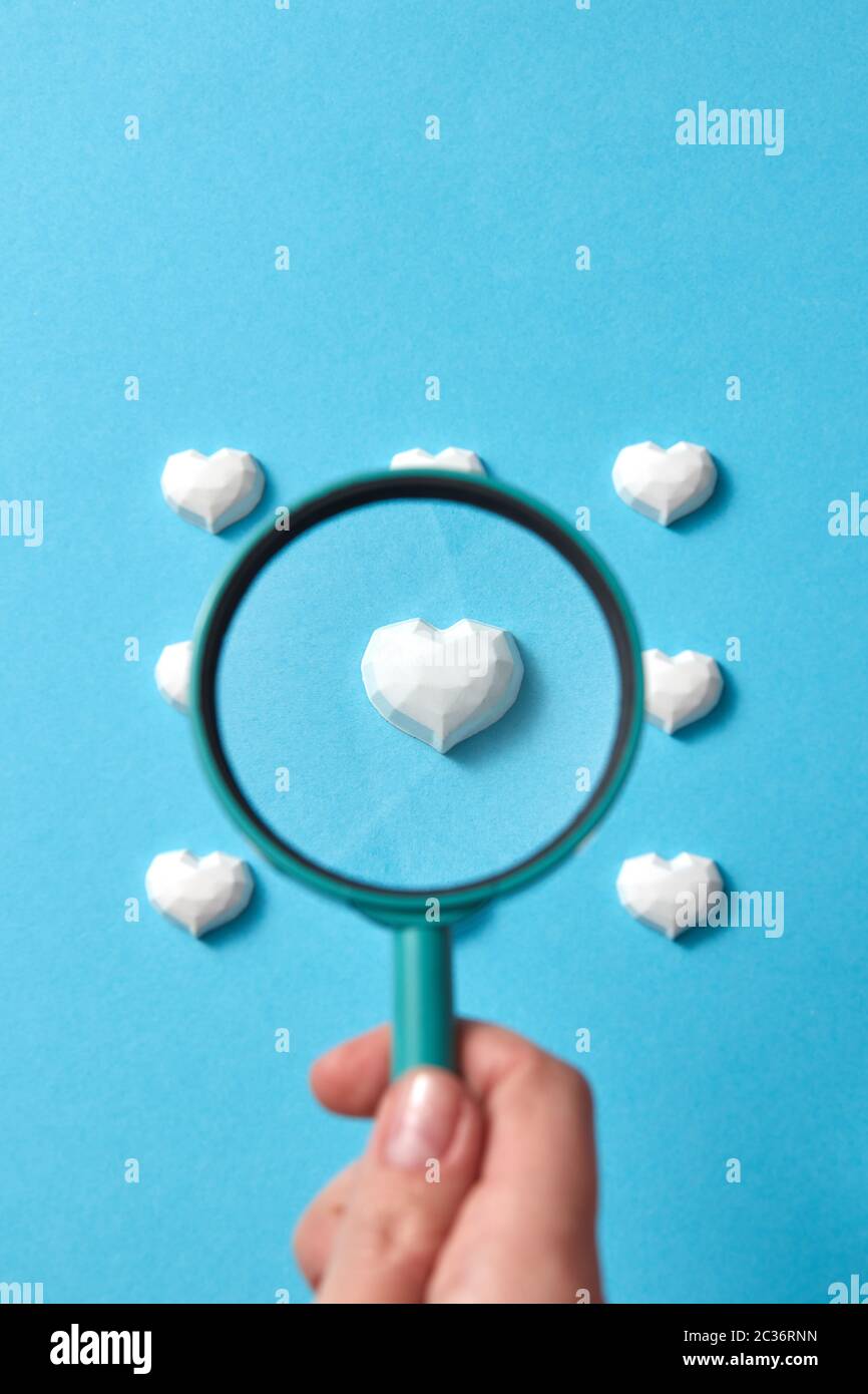 Womans hand painted blue holds hi-res stock photography and images - Alamy