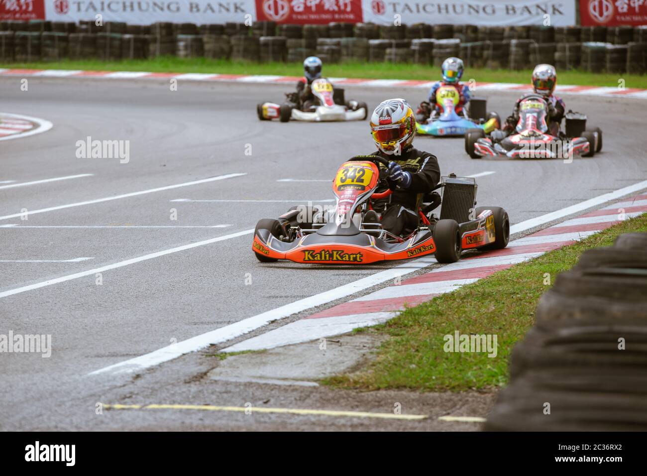 Kart racers competing on the race track Stock Photo - Alamy