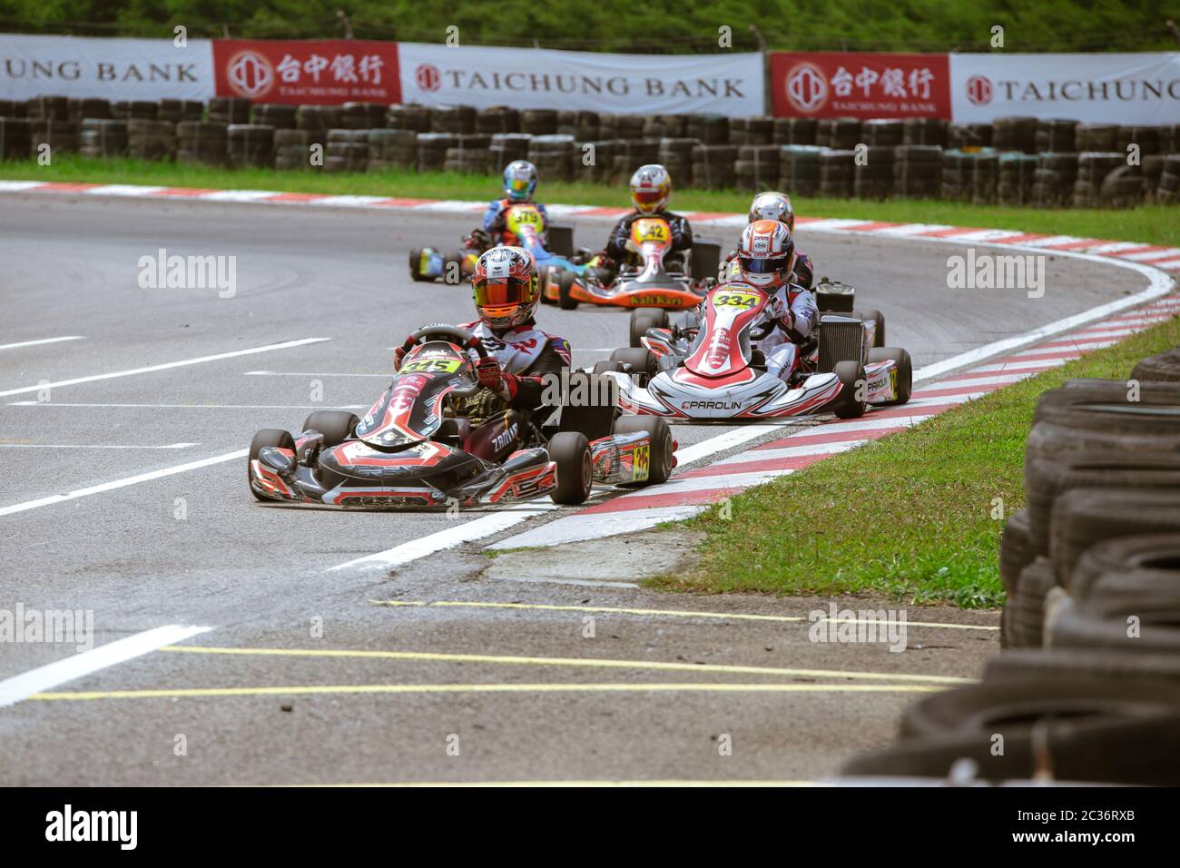 Kart racers competing on the race track Stock Photo - Alamy