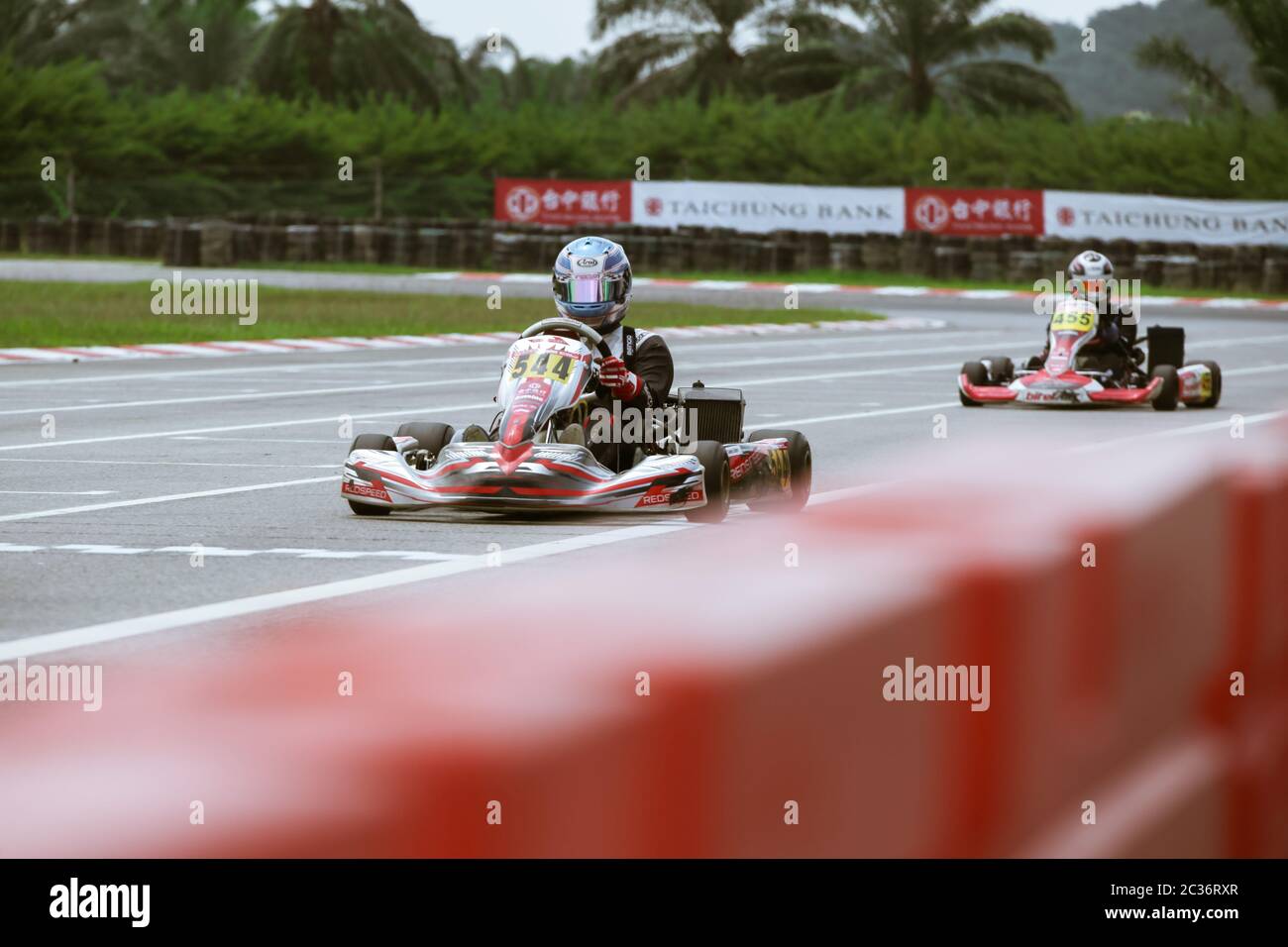 Kart racers competing on the race track Stock Photo - Alamy