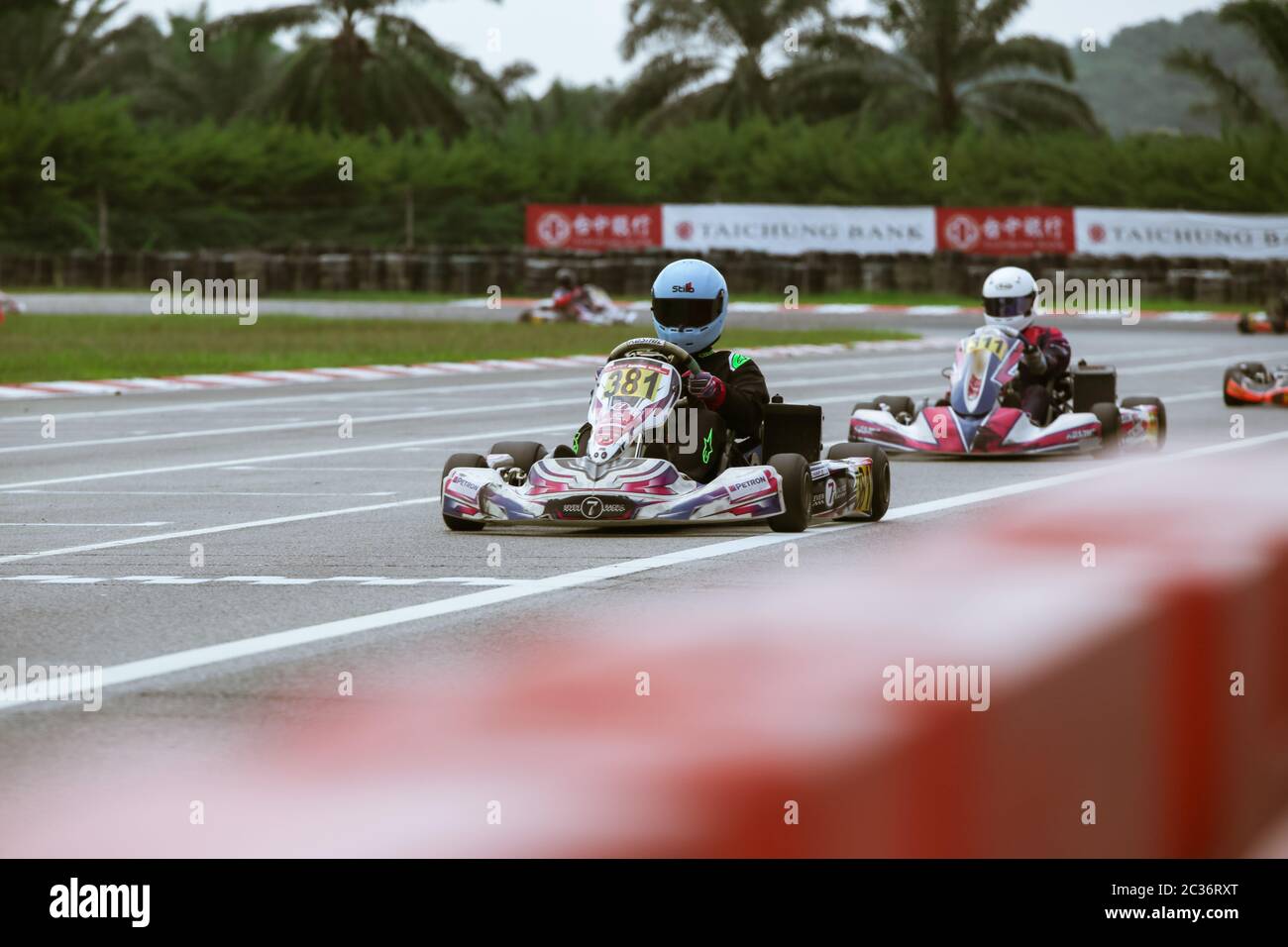 Kart racers competing on the race track Stock Photo - Alamy