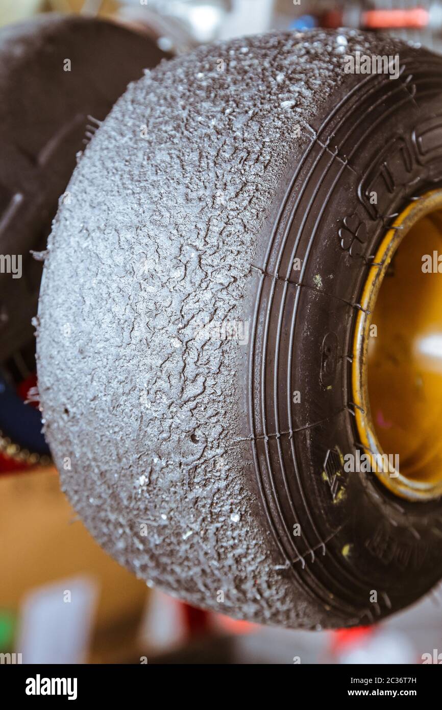 Worn out kart tyre after an intense race Stock Photo - Alamy