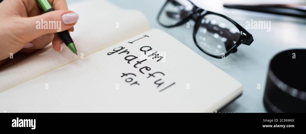 Gratitude Journal Concept. Writing I Am Grateful In Journal Stock Photo ...