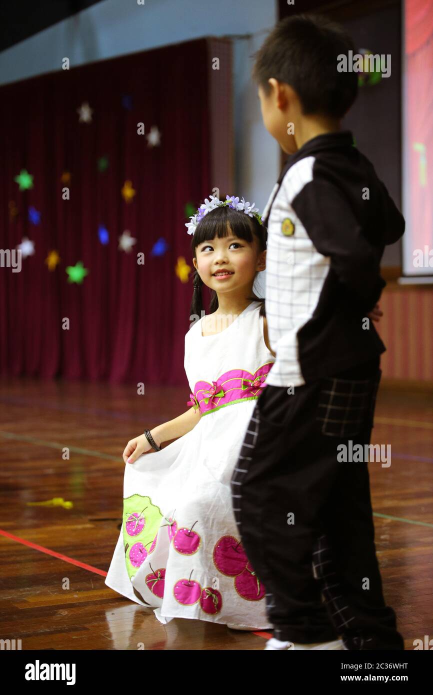 Kindergarten kids perform ance on stage during their year end ... Kindergarten kids perform ance on stage during their year end ...