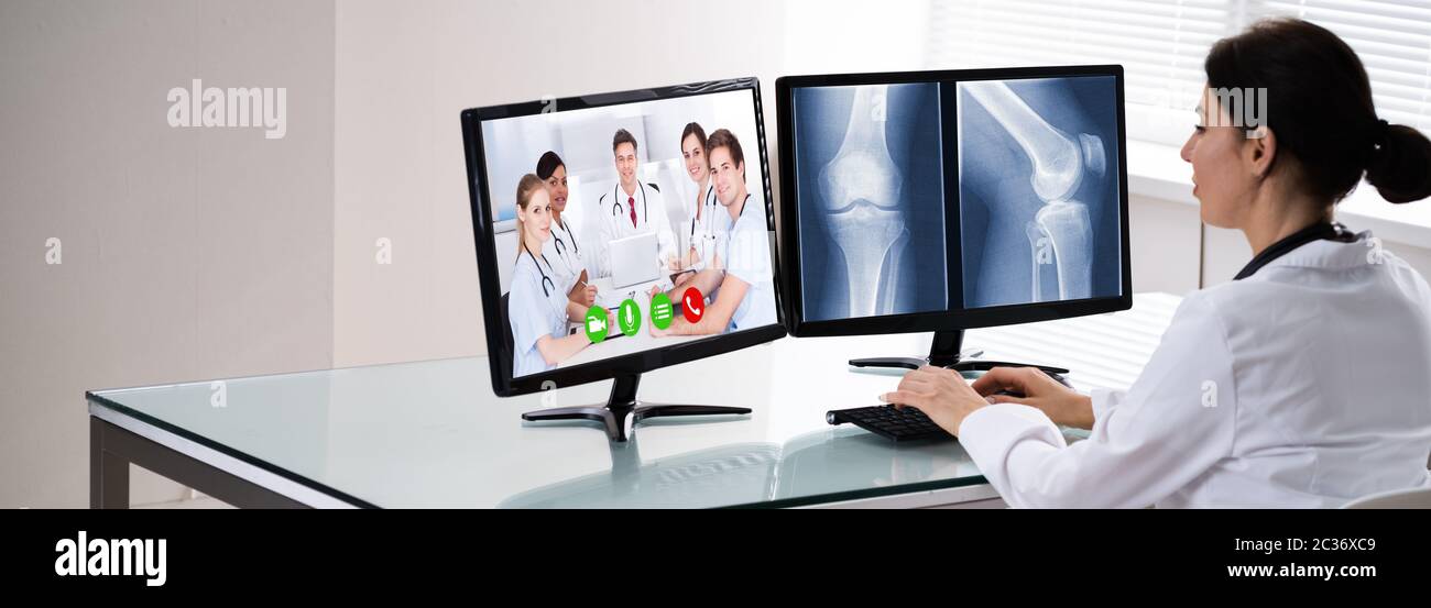 Medical Doctor Using Online Elearning Video Conference Technology Stock ...