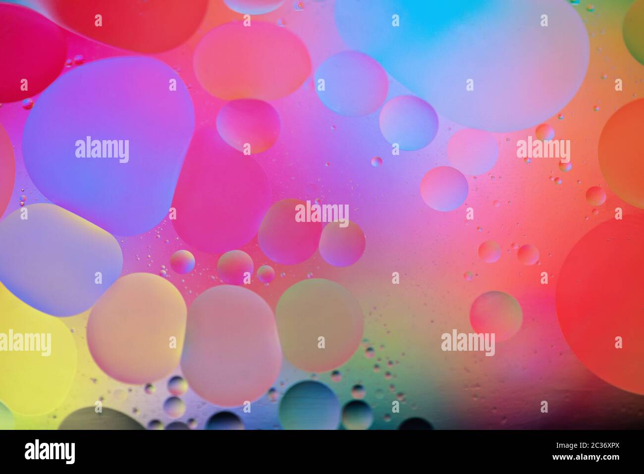 Oil drops in water. Abstract psychedelic pattern image rainbow colored ...