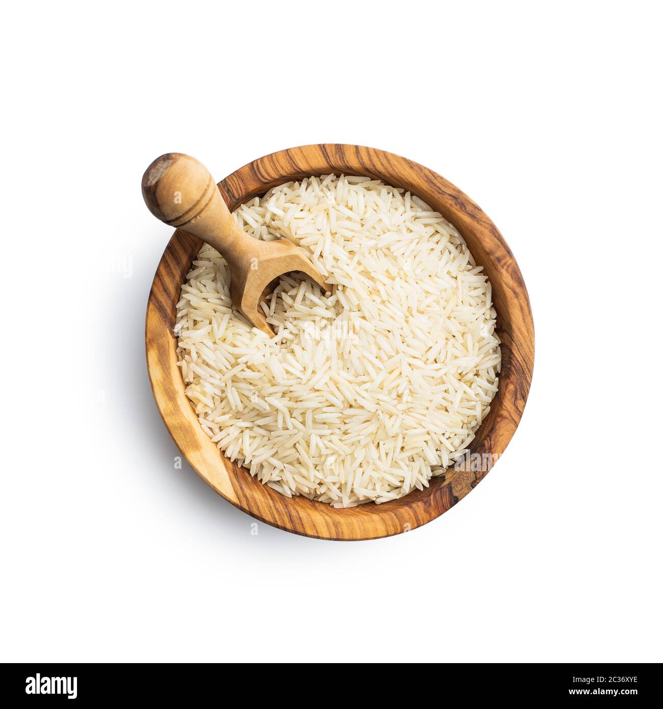 Uncooked indian long rice in bowl isolated on white background Stock ...