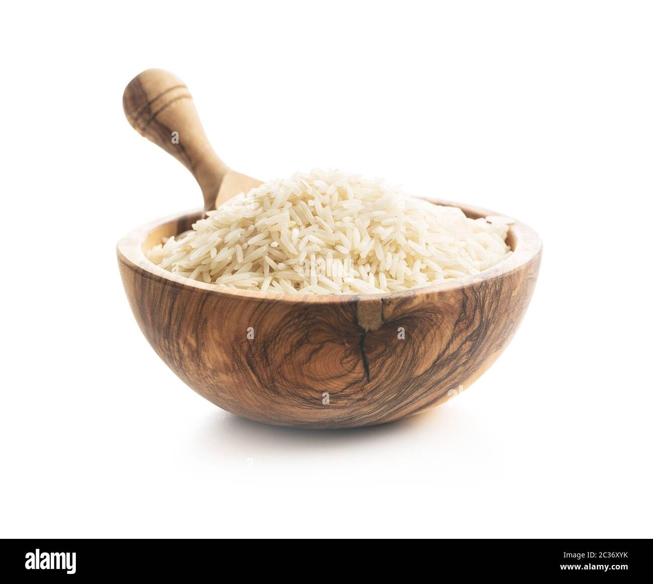 Uncooked indian long rice in bowl isolated on white background Stock ...