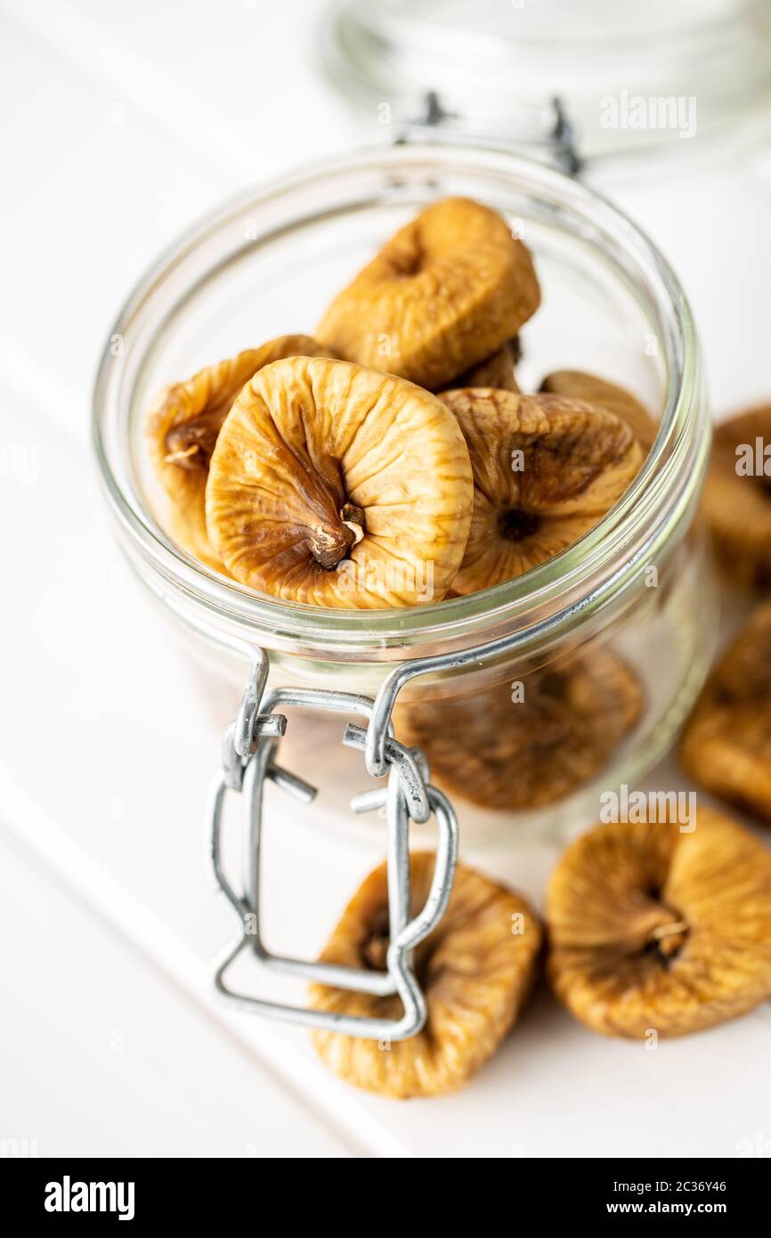 Sweet dried figs in jar Stock Photo - Alamy