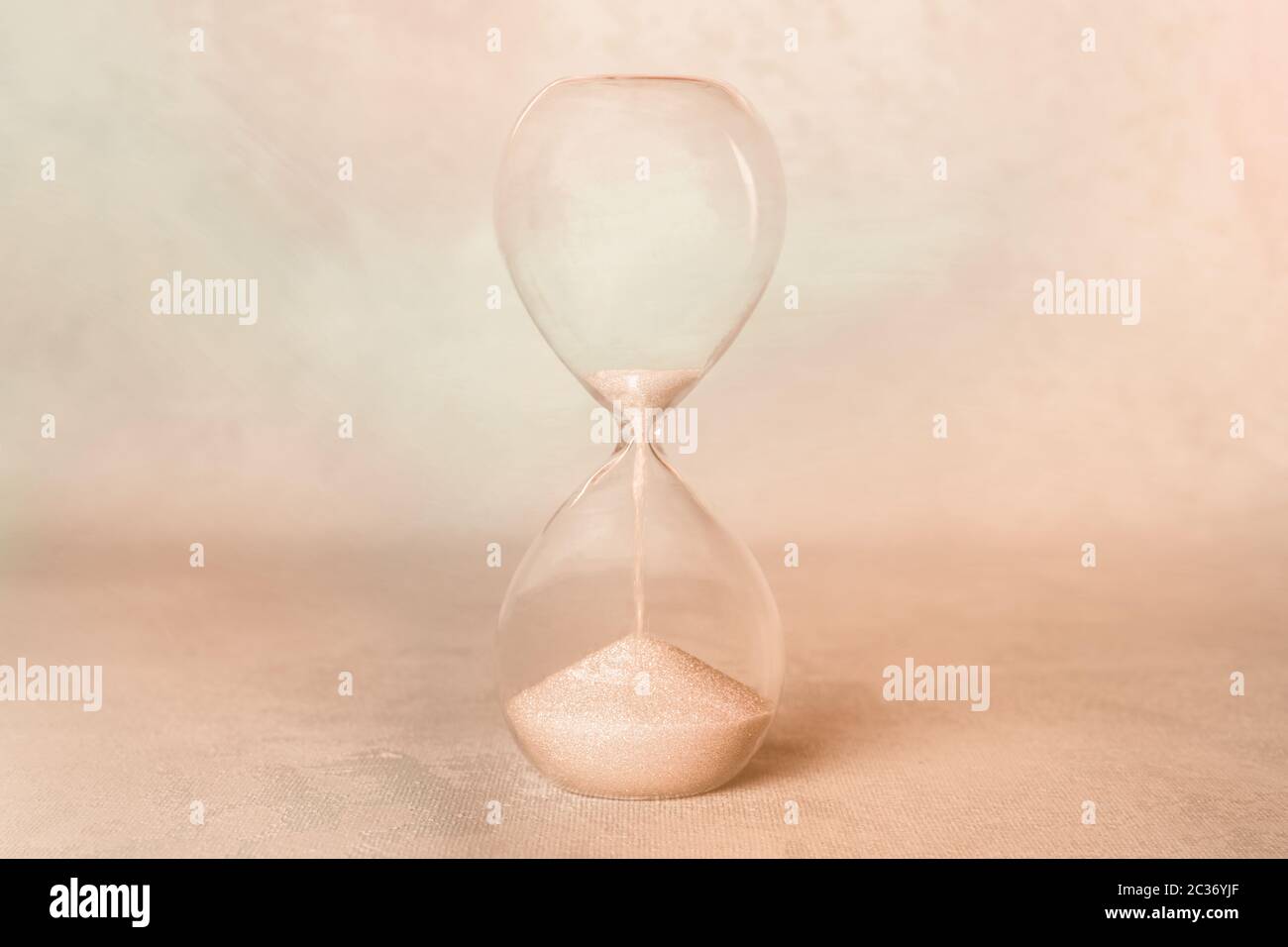 Time. An hourglass with sand falling through. Old age, nostalgia ...
