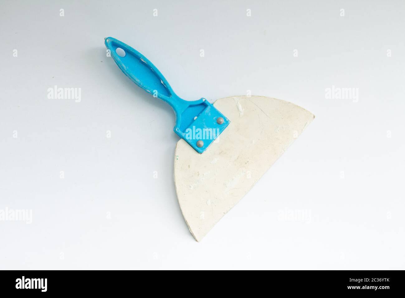 tile spatula on white background Stock Photo - Alamy