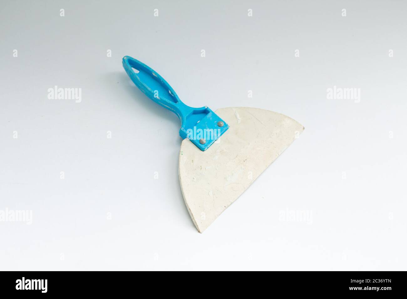 tile spatula on white background Stock Photo - Alamy