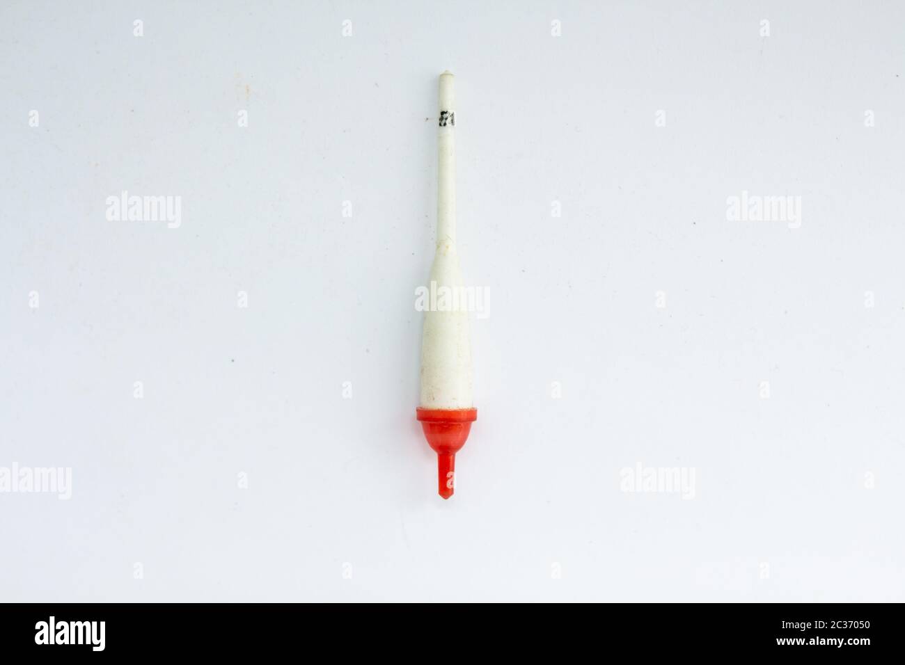 fishing float on white background Stock Photo - Alamy