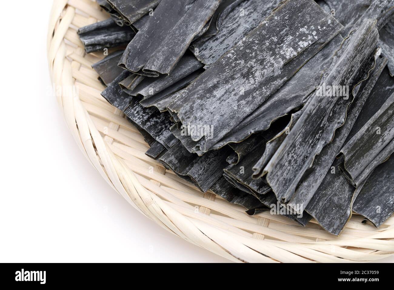 Japanese food konbu kelp in a bamboo basket Stock Photo - Alamy