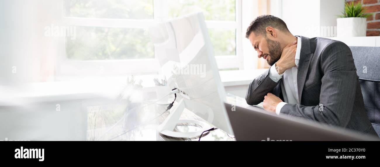 Neck Pain Bad Posture Stress Work At Computer Stock Photo - Alamy