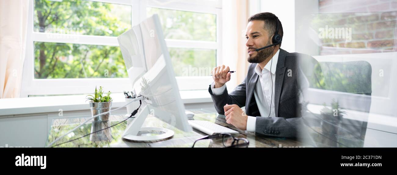 Customer Service Agent Man In Call Center Stock Photo - Alamy
