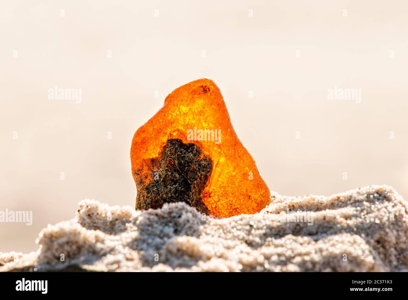 Amber on a beach of the Baltic Sea Stock Photo - Alamy