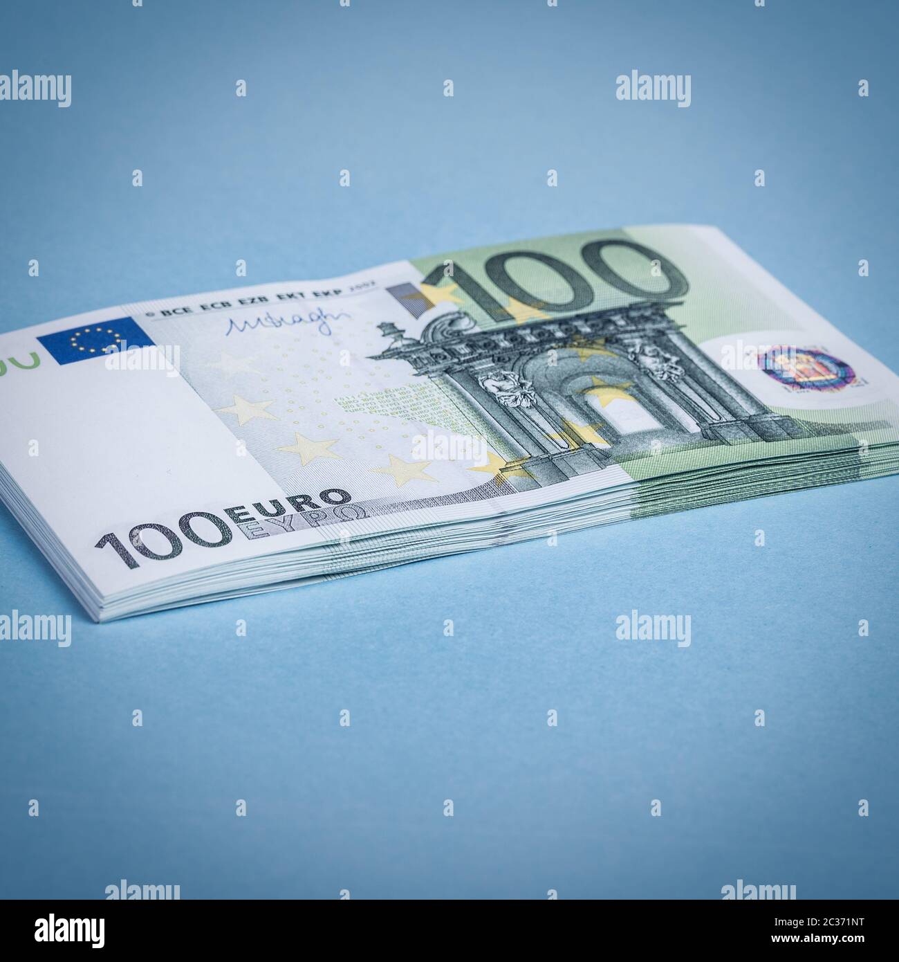 Euro cash on a blue and pink background. Euro Money Banknotes. Euro ...