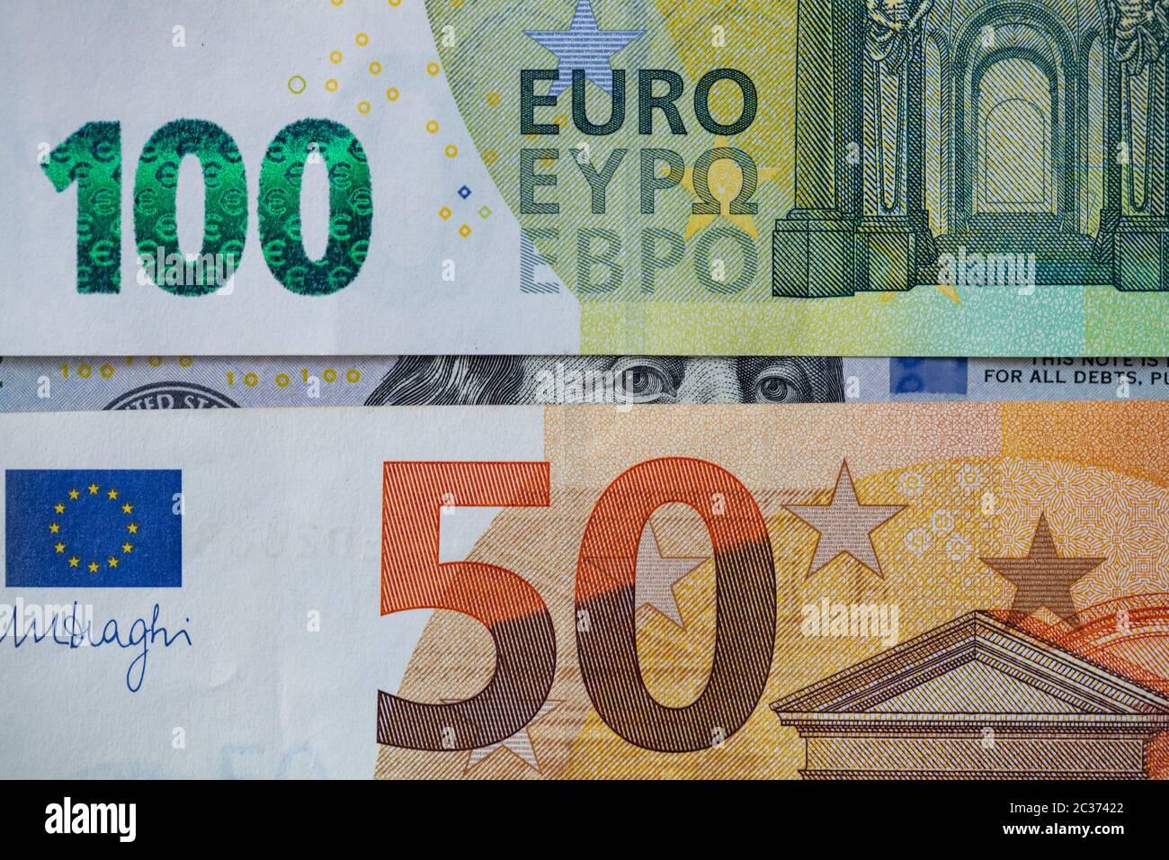 Benjamin Franklin peeking through euro banknotes Stock Photo - Alamy