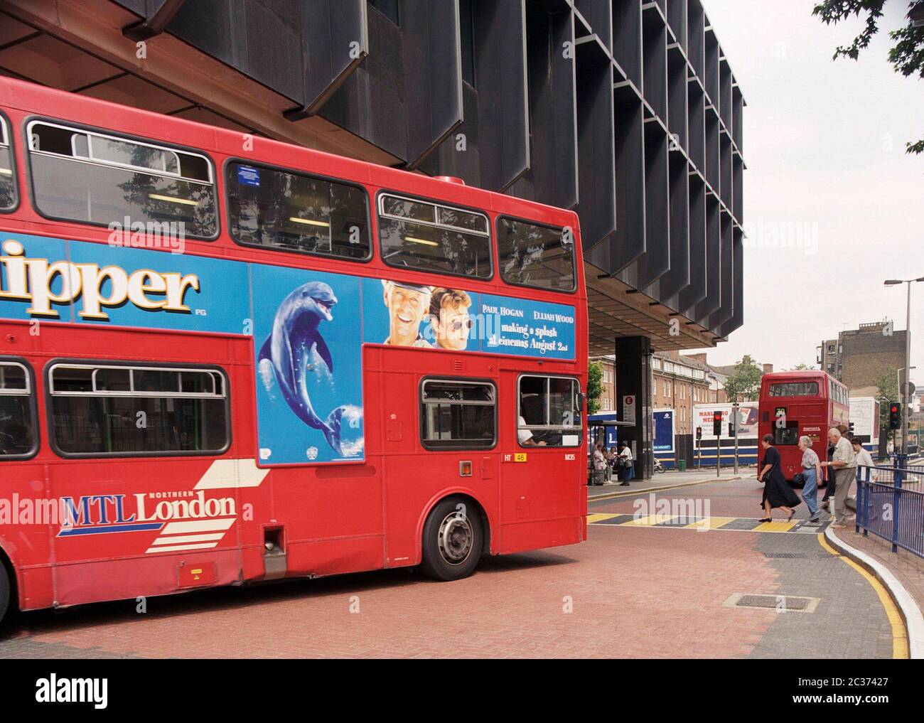 Buses and people travelling at Euston Bus Station, London, UK in 1996 ...