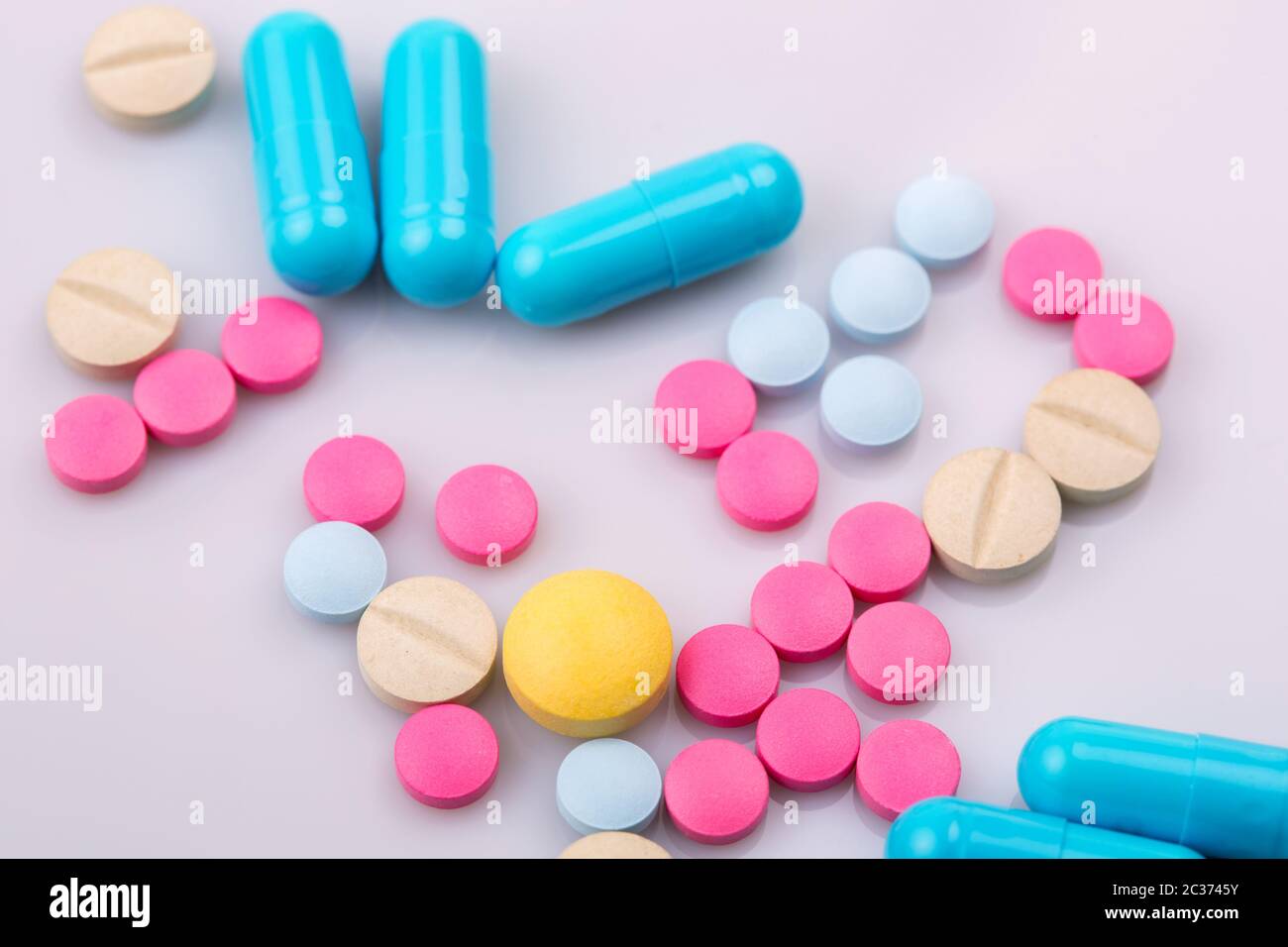 different Tablets pills capsule heap mix therapy drugs Stock Photo - Alamy