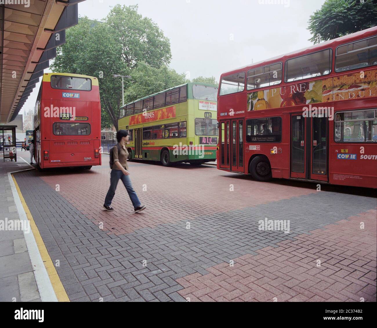 Buses and people travelling at Euston Bus Station, London, UK in 1996 ...
