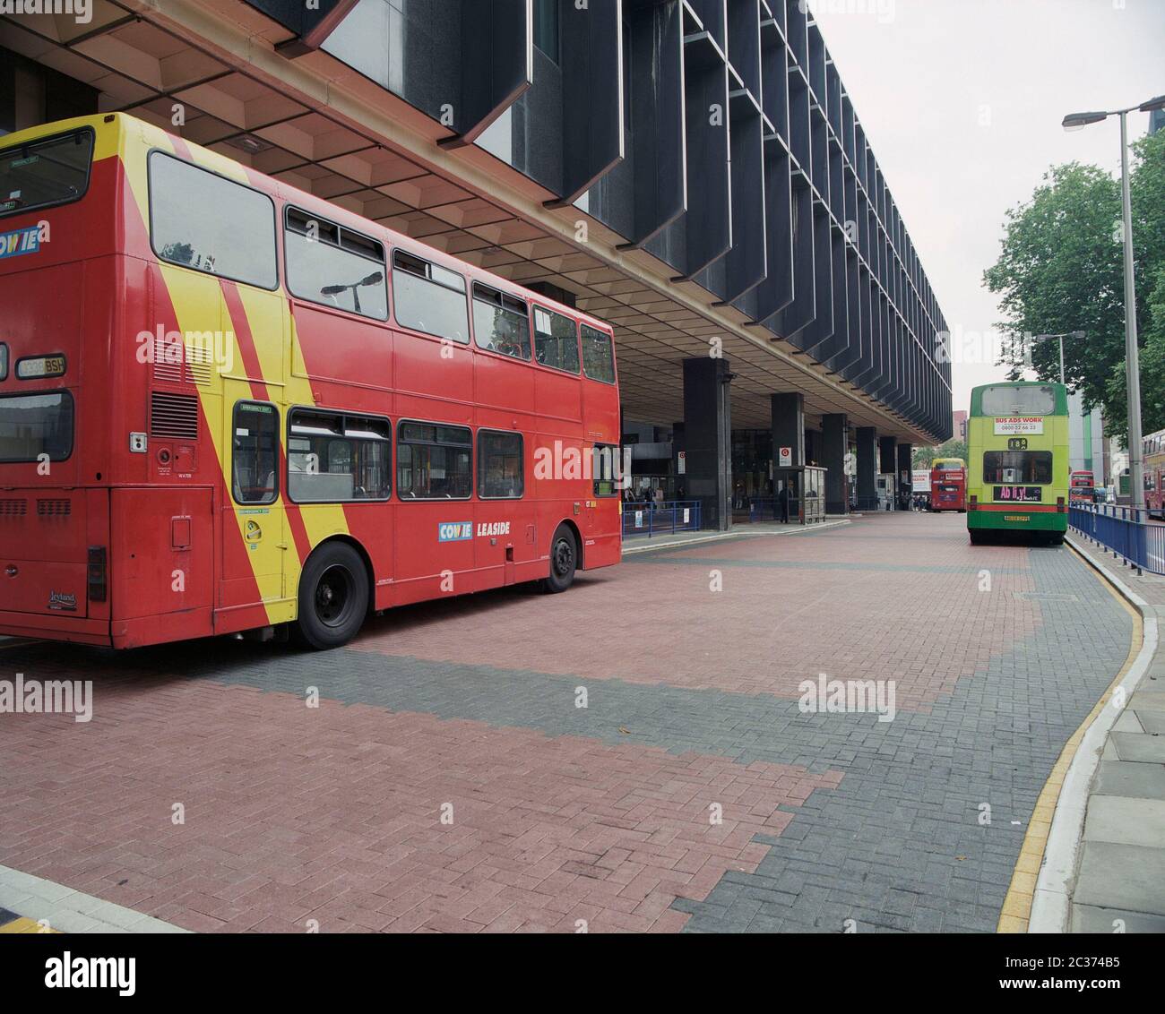 Buses and people travelling at Euston Bus Station, London, UK in 1996 ...