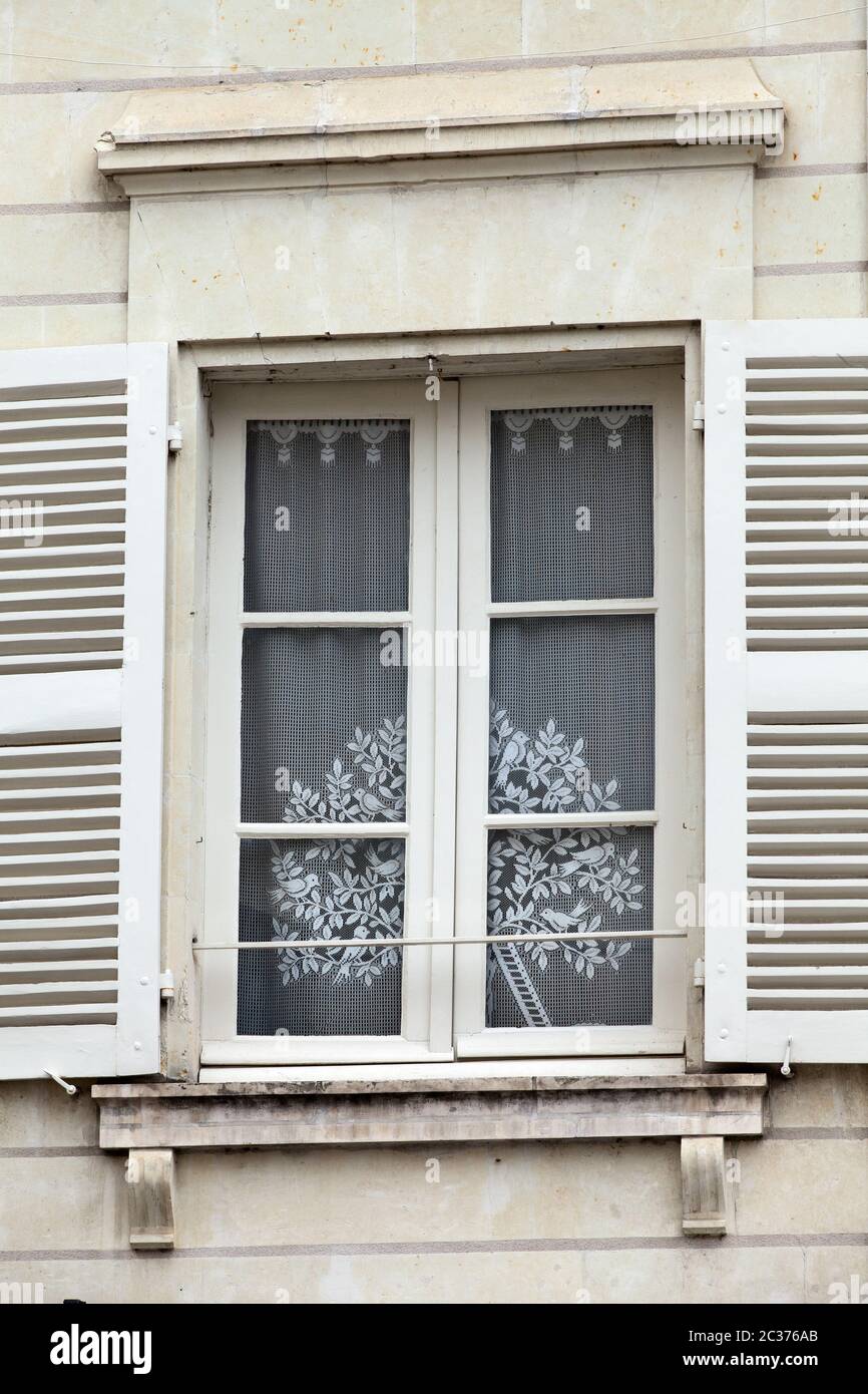 White window with shutters Stock Photo - Alamy