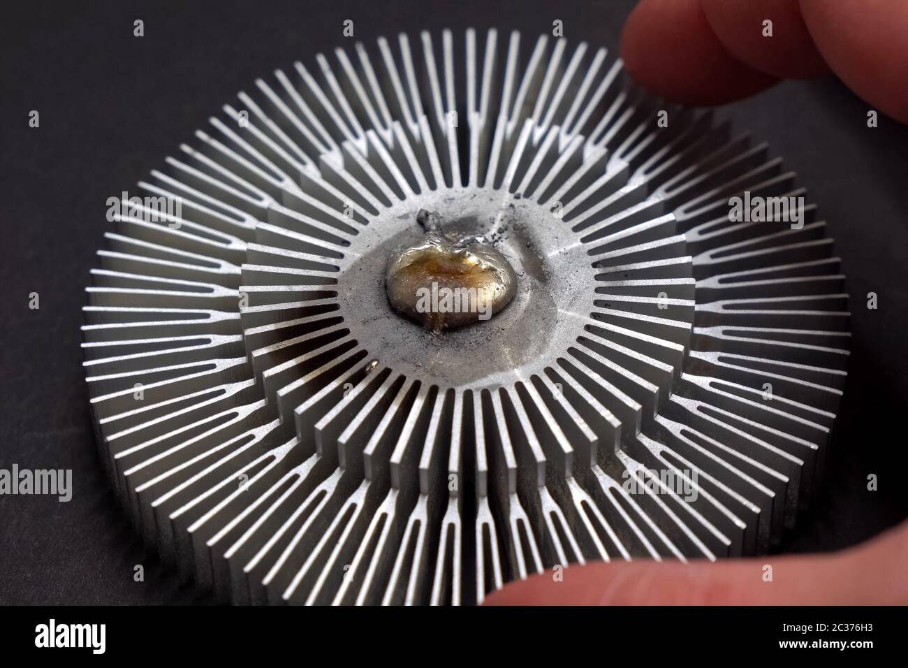 Liquid metal on an aluminum processor cooling radiator Stock Photo - Alamy