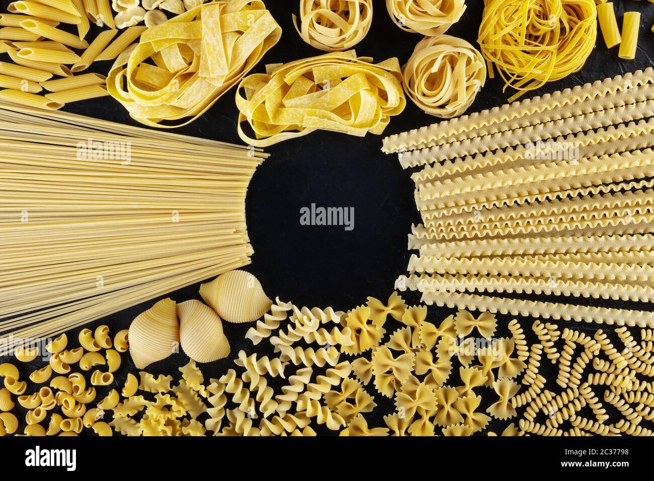Italian pasta design with copy space, a flat lay of a variety of pasta ...