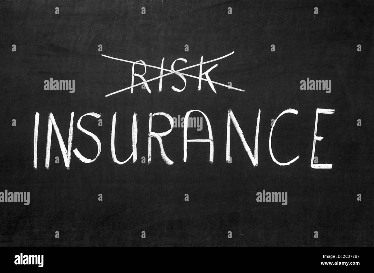 Insurance risk crossed out on the grey blackboard Stock Photo - Alamy