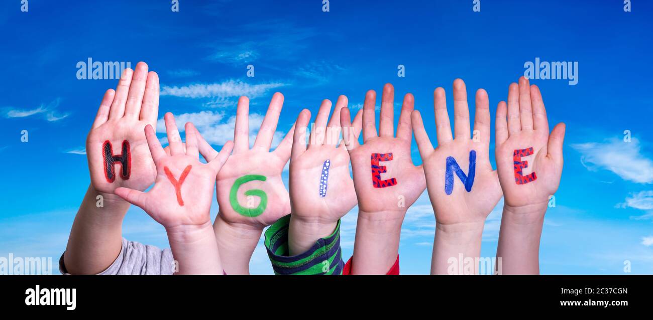 Kids Hands Holding Colorful English Word Hygiene. Blue Sky As ...