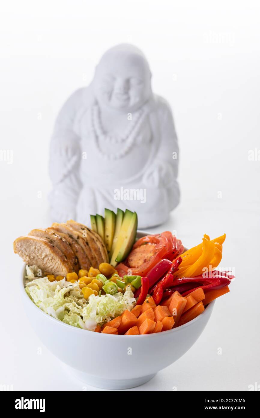 buddha bowl with chicken on white Stock Photo - Alamy