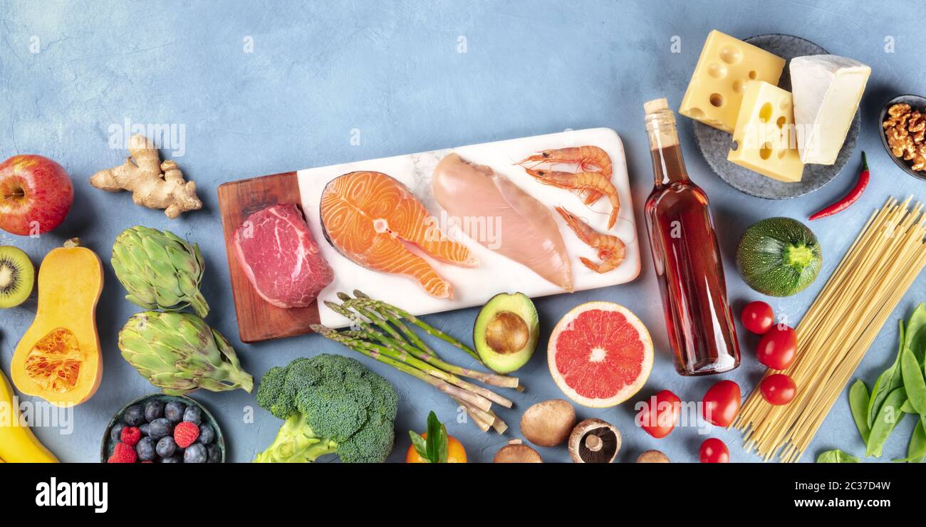 Food panorama. Beef meat, salmon fish, chicken and shrimps, vegetables ...