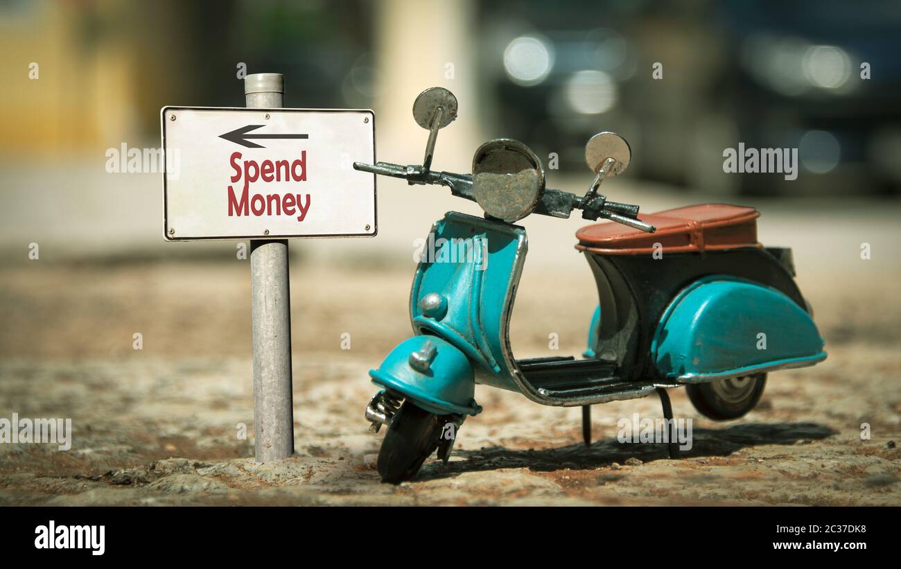 Street Sign the Direction Way to Spend Money Stock Photo - Alamy