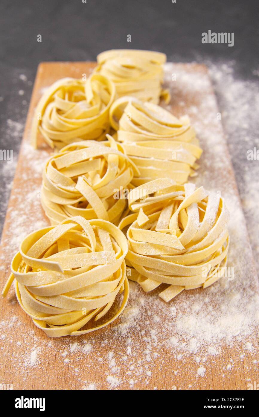 Variety of italian homemade raw uncooked pasta spaghetti and ...