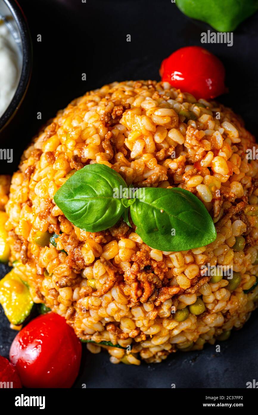 rustic bulgur fried with minced meat and vegetables Stock Photo - Alamy