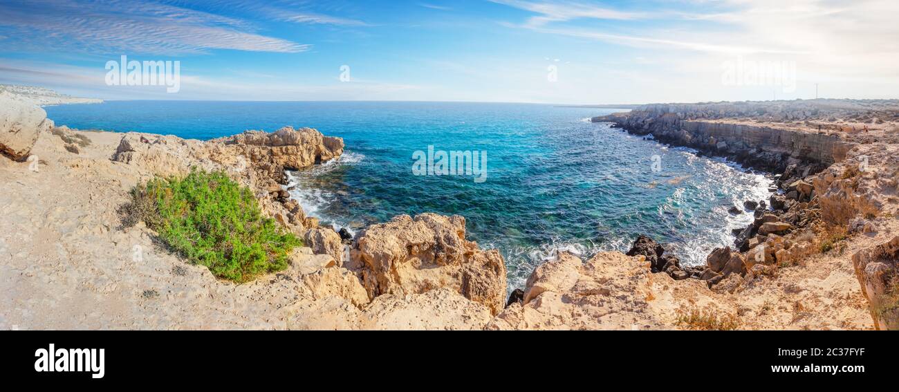 Cove with azure water at Cape Cavo Greco. A popular tourist destination ...