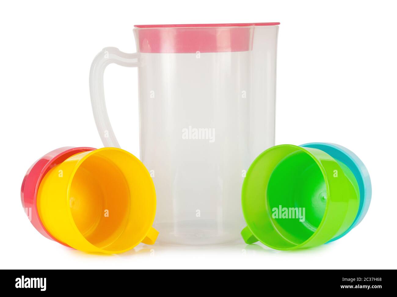 Clear jug with cup isolated on white background Stock Photo - Alamy