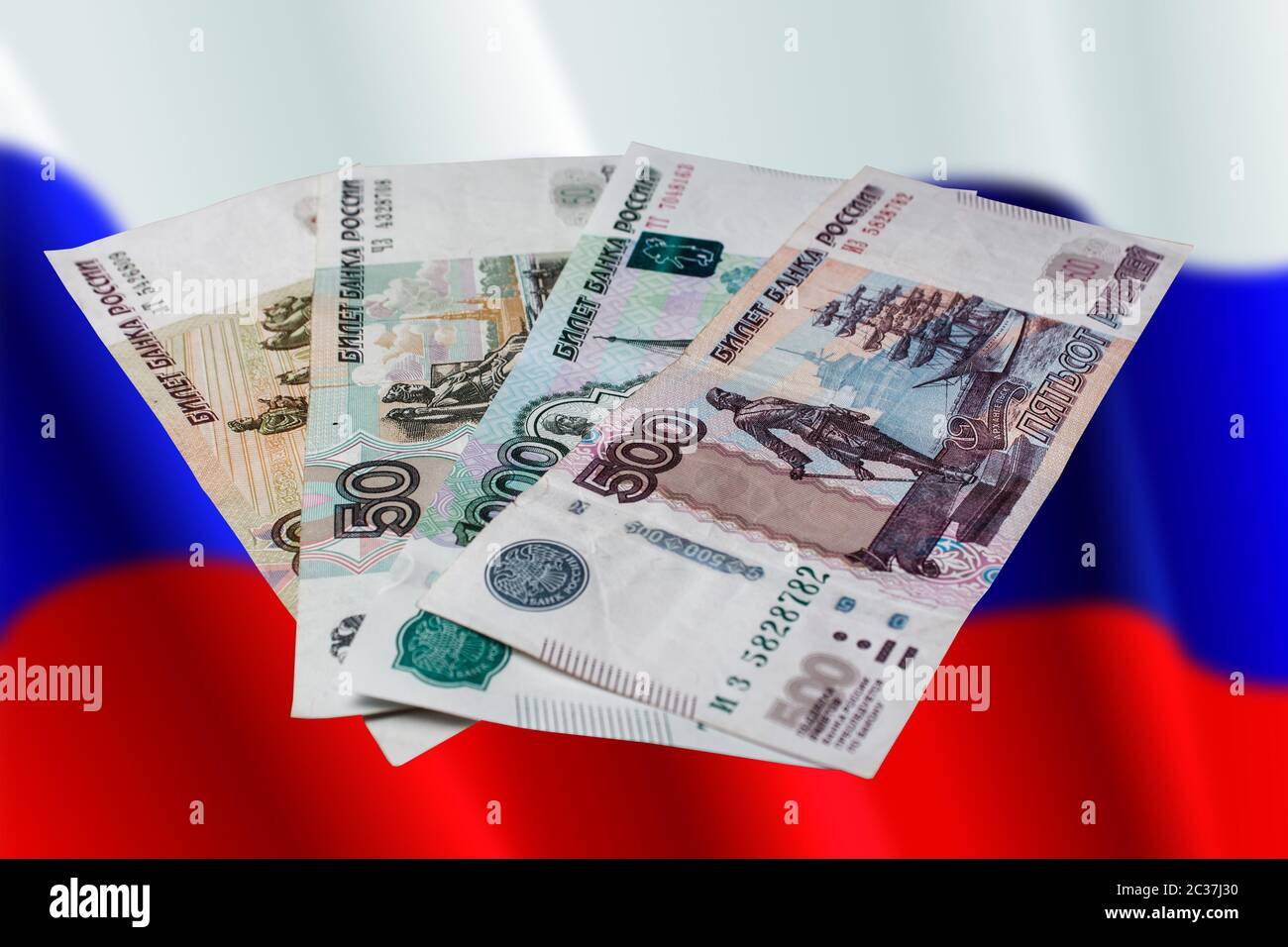 Russian rubles on a colored background. Banknotes of Russian money ...