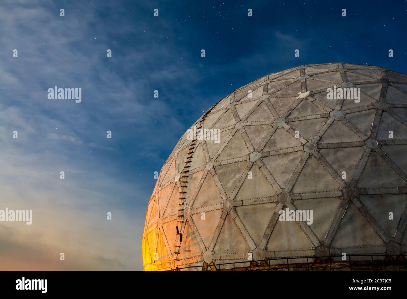 Morning light reflects on old abandoned soviet long range radar station ...
