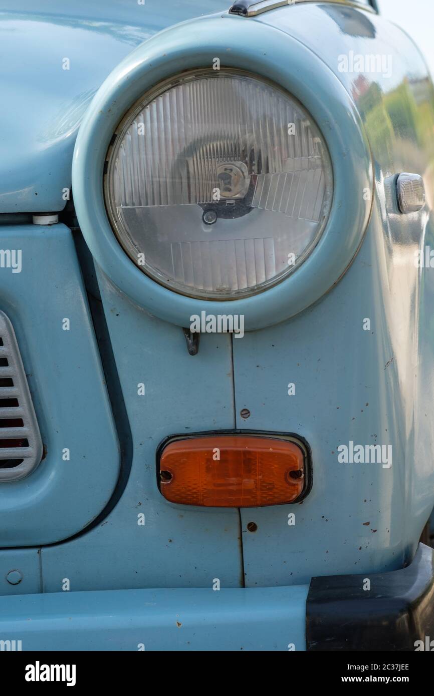 Blue trabant car headlight in vertical format Stock Photo - Alamy