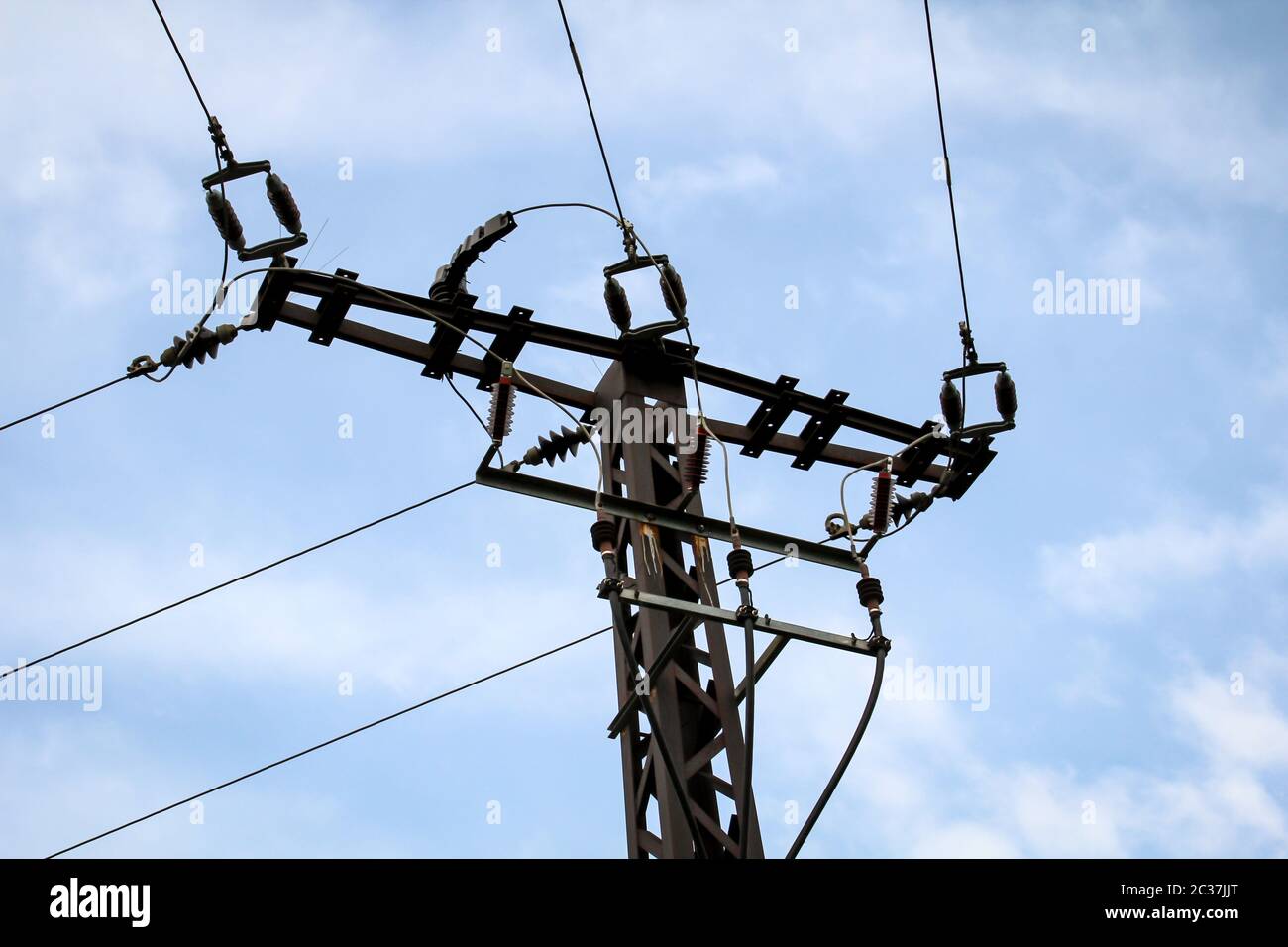 A mast, power pole at which the lines change direction Stock Photo - Alamy