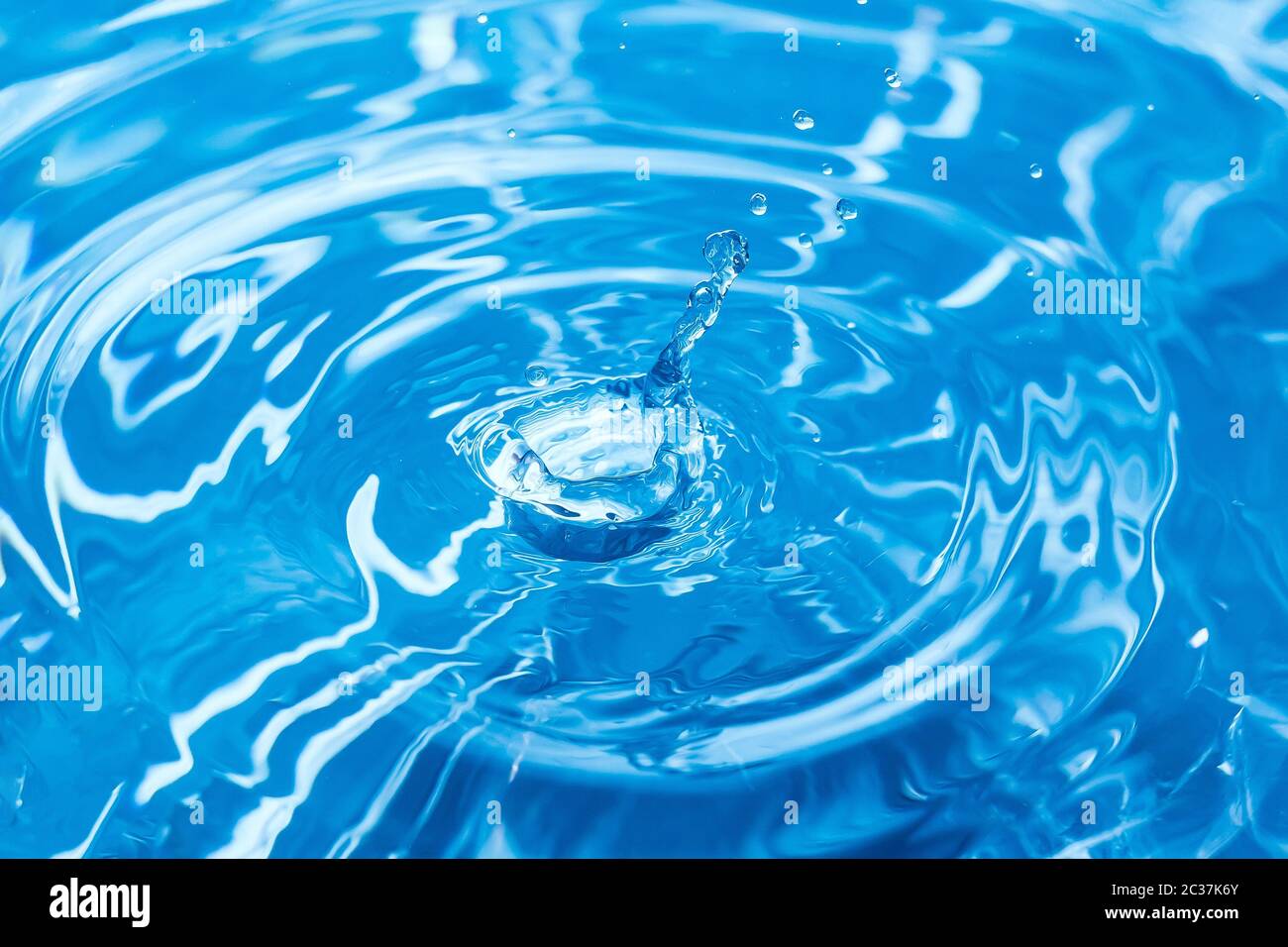 Water splash or drop. Water splash close-up. Blue water drop. Falling ...