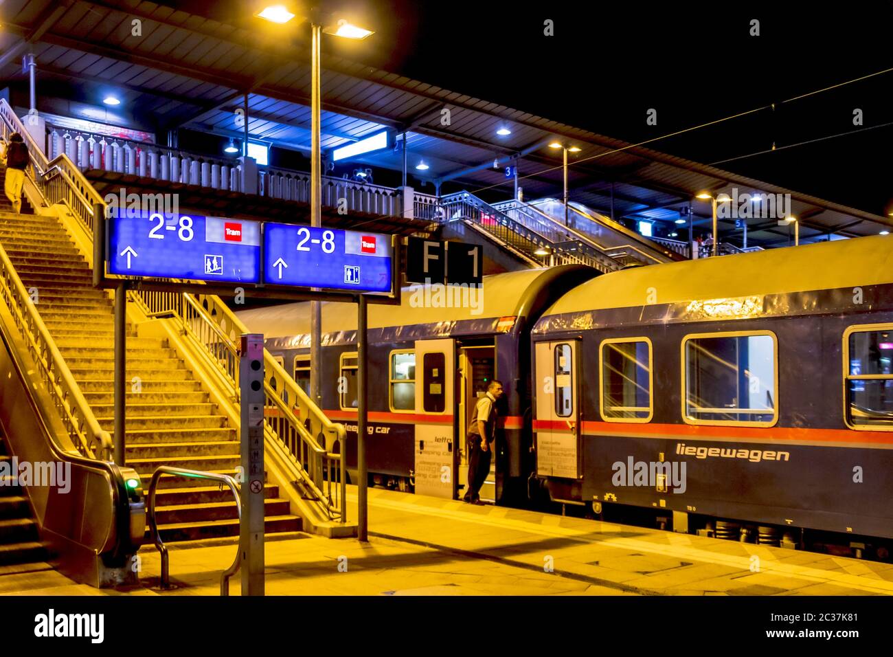 Bus waiting at train tracks hi-res stock photography and images - Alamy